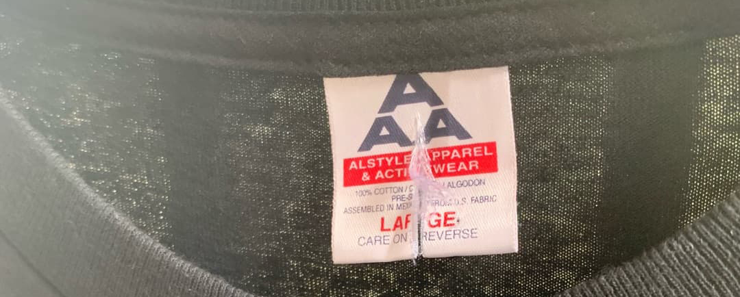 Why Certain T-Shirt Tags are Torn Up The Middle: Factory Rejects